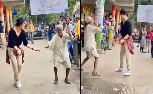 Video: Old Man OO Jane Jane Song Dance With Foreigner Goes Viral - Sakshi