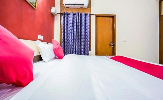 Police Raids on OYO Hotel in Madhapur - Sakshi