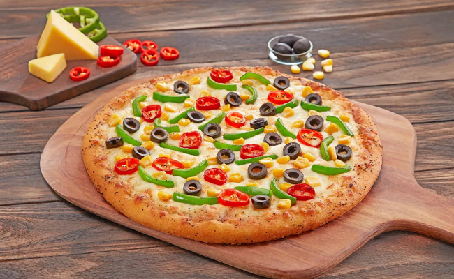 Domino's former CEO Ritch Allison spent $4000 for pizzas in 1 year - Sakshi