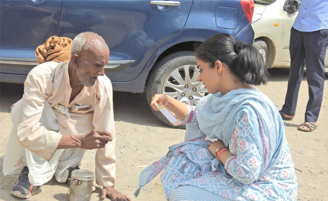 UP IAS Officer Gesture For Disabled Elderly Man Goes Viral - Sakshi