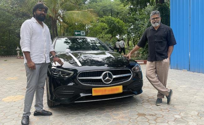 Benz Car Gift To Virupaksha Movie Director Karthika Varma, Pics Goes Viral - Sakshi