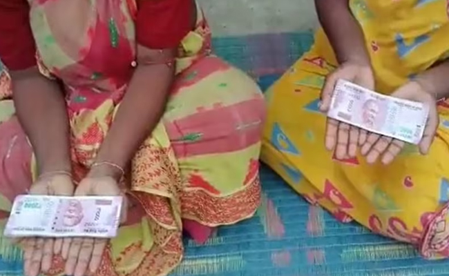 TMC leader distributed Rs 2000 notes as Odisha train accident aid - Sakshi