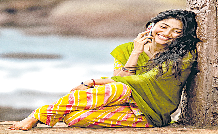 Tandel: ప్రేమ కబుర్లు | Sai Pallavi Special Poster Released From Tandel Movie, Goes Viral | Sakshi