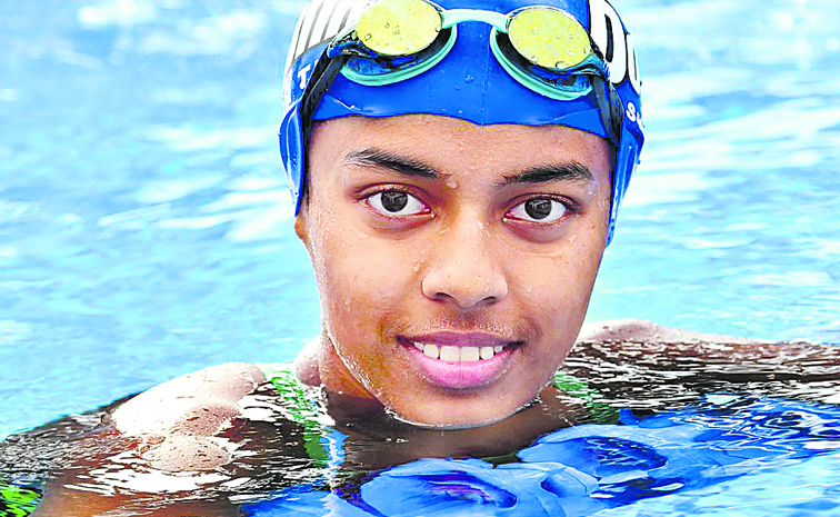 ఒలింపిక్స్‌లో 14 ఏళ్ల చేపపిల్ల | 14 year old swimmer Dhinidhi Desinghu ...