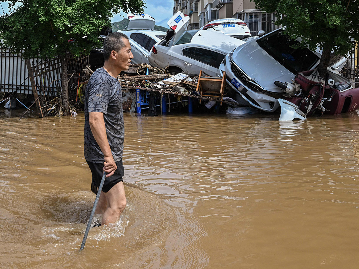 వరద బీభత్సం..చైనా అతలాకుతలం (ఫొటోలు) | Heavy Floods In China Photos ...