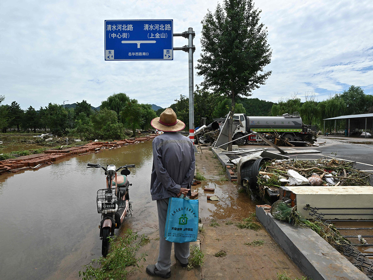 వరద బీభత్సం..చైనా అతలాకుతలం (ఫొటోలు) | Heavy Floods In China Photos ...
